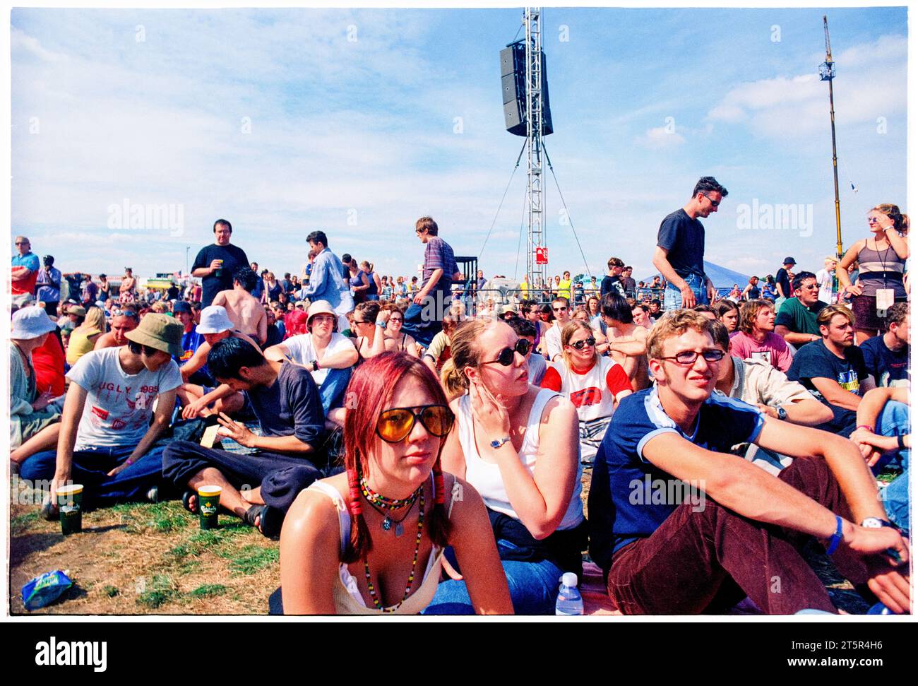 BRITPOP and ROCK FANS, READING FESTIVAL, 1998: Young friends share a ...