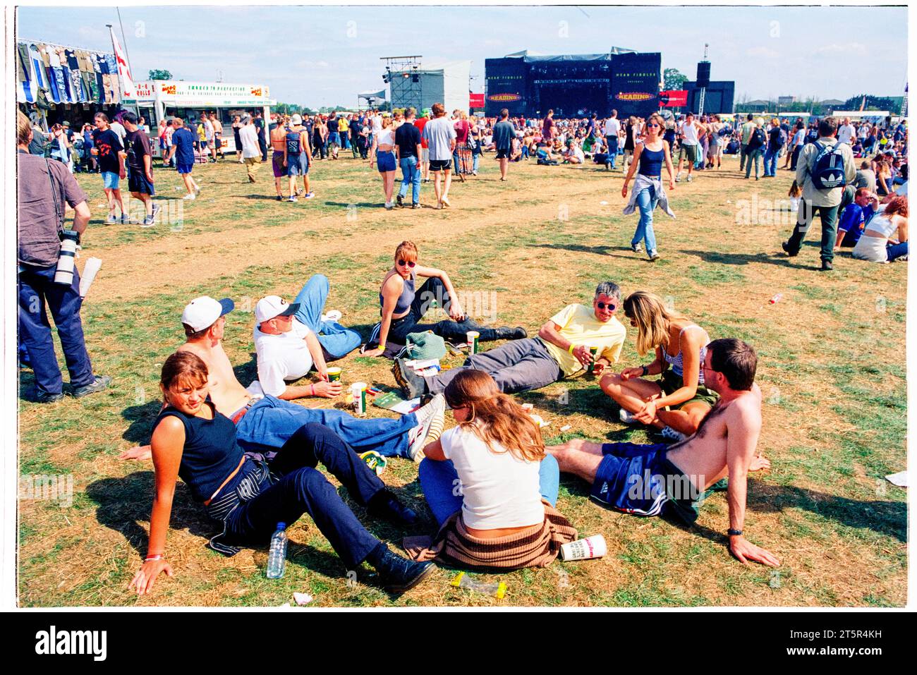 BRITPOP and ROCK FANS, READING FESTIVAL, 1998: Young friends share a ...