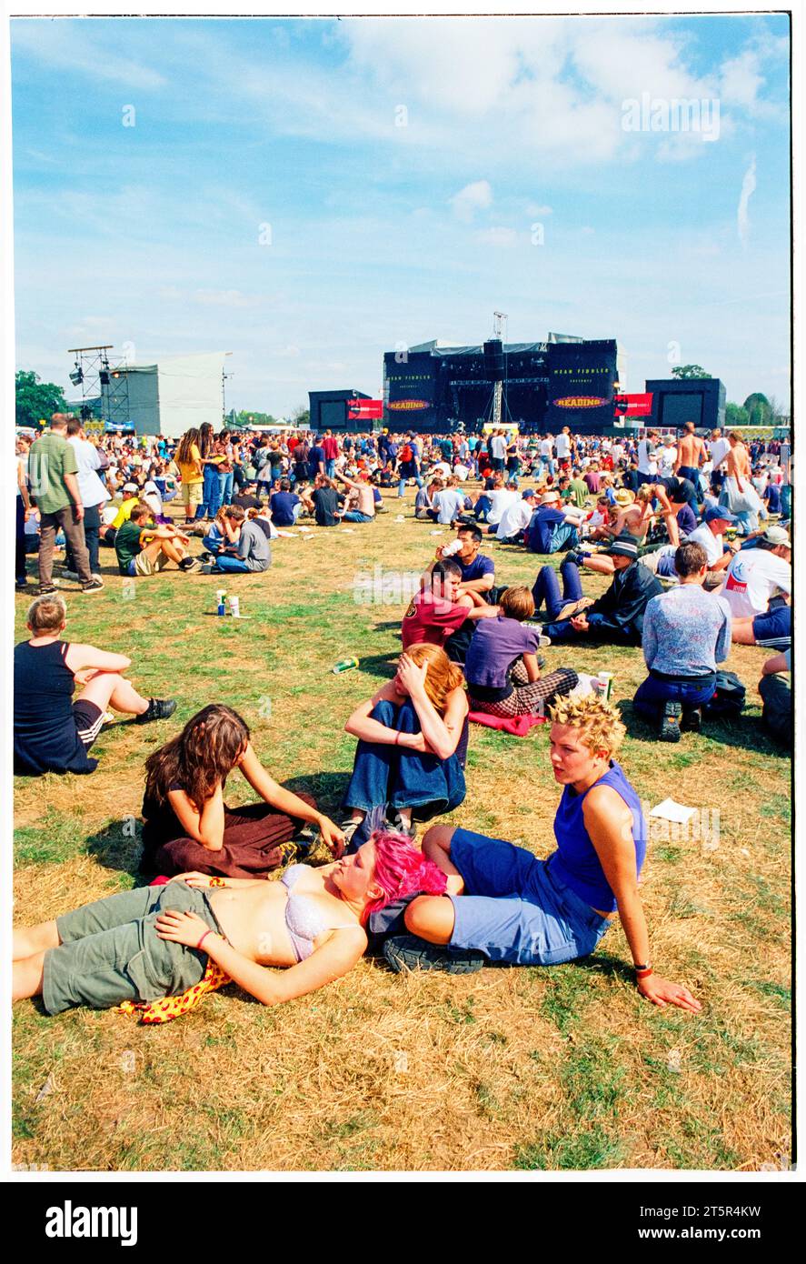 BRITPOP and ROCK FANS, READING FESTIVAL, 1998: Young friends share a ...