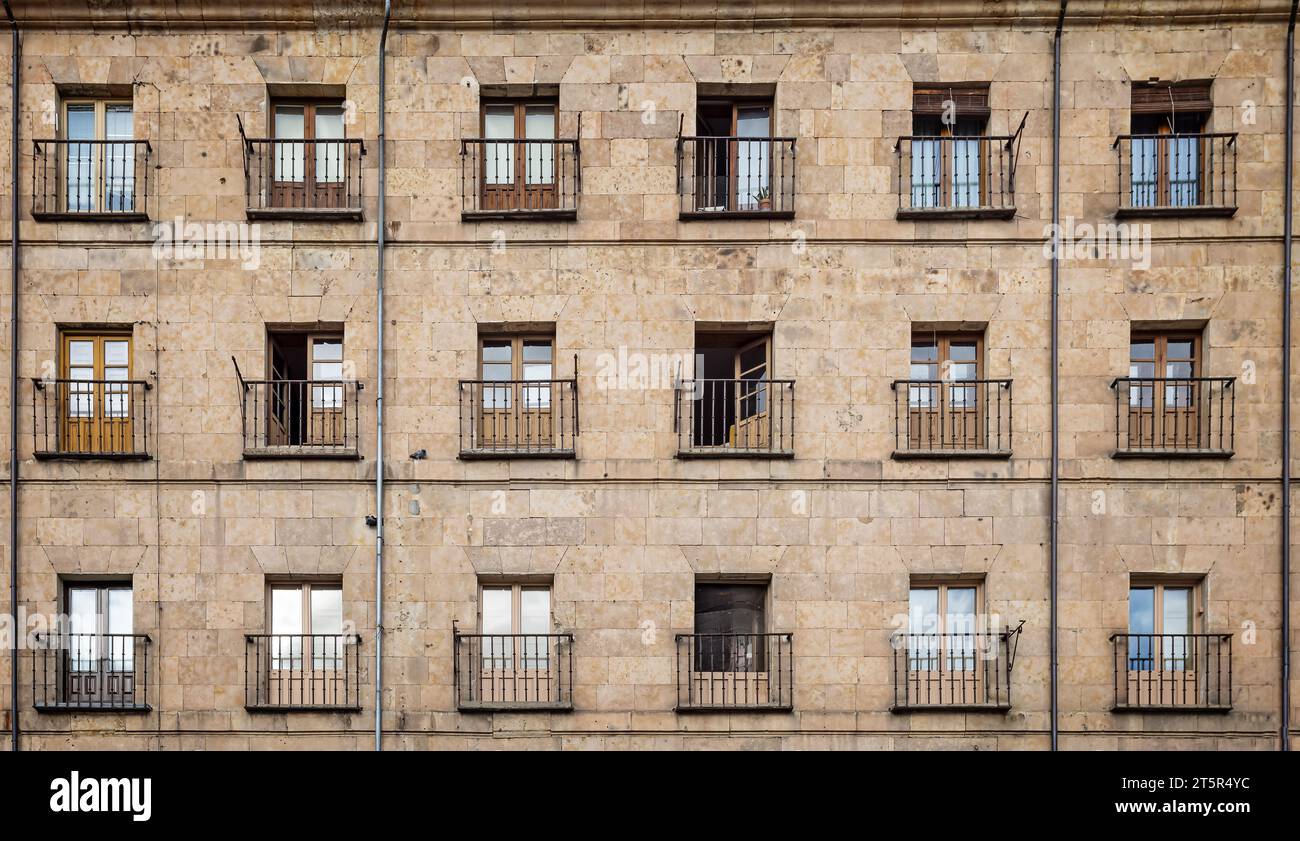 Pattern of balconied windows on terrace of houses in Salamanca, Spain ...