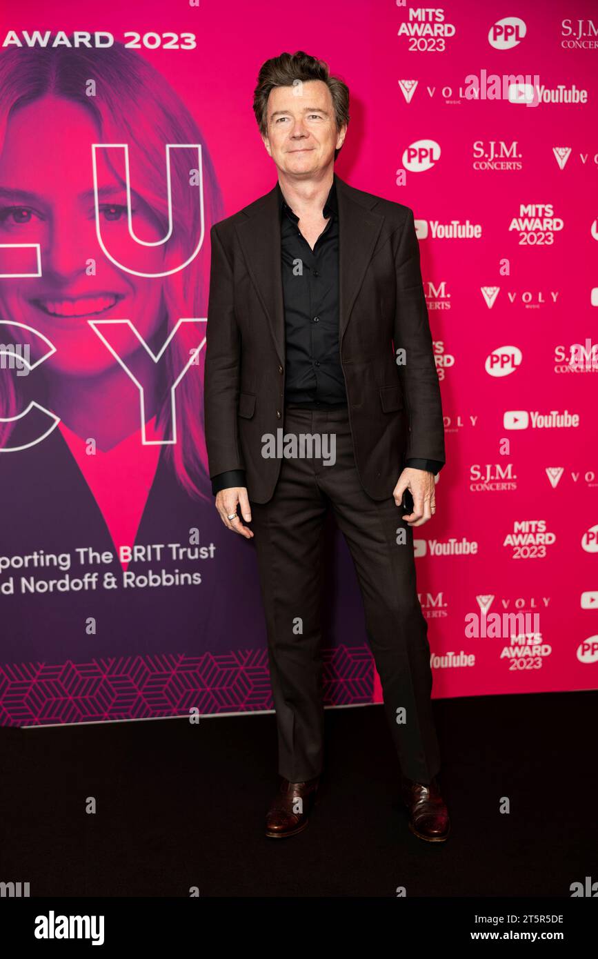 Rick Astley poses for photographers upon arrival at the Music Industry ...