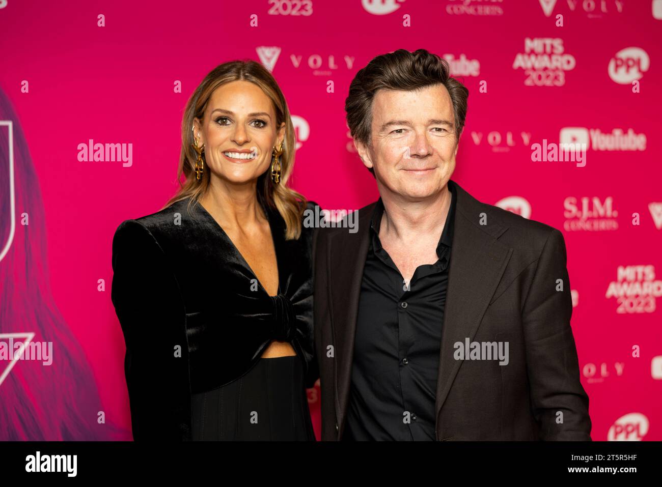Lucy Dickins and Rick Astley pose for photographers upon arrival at the ...