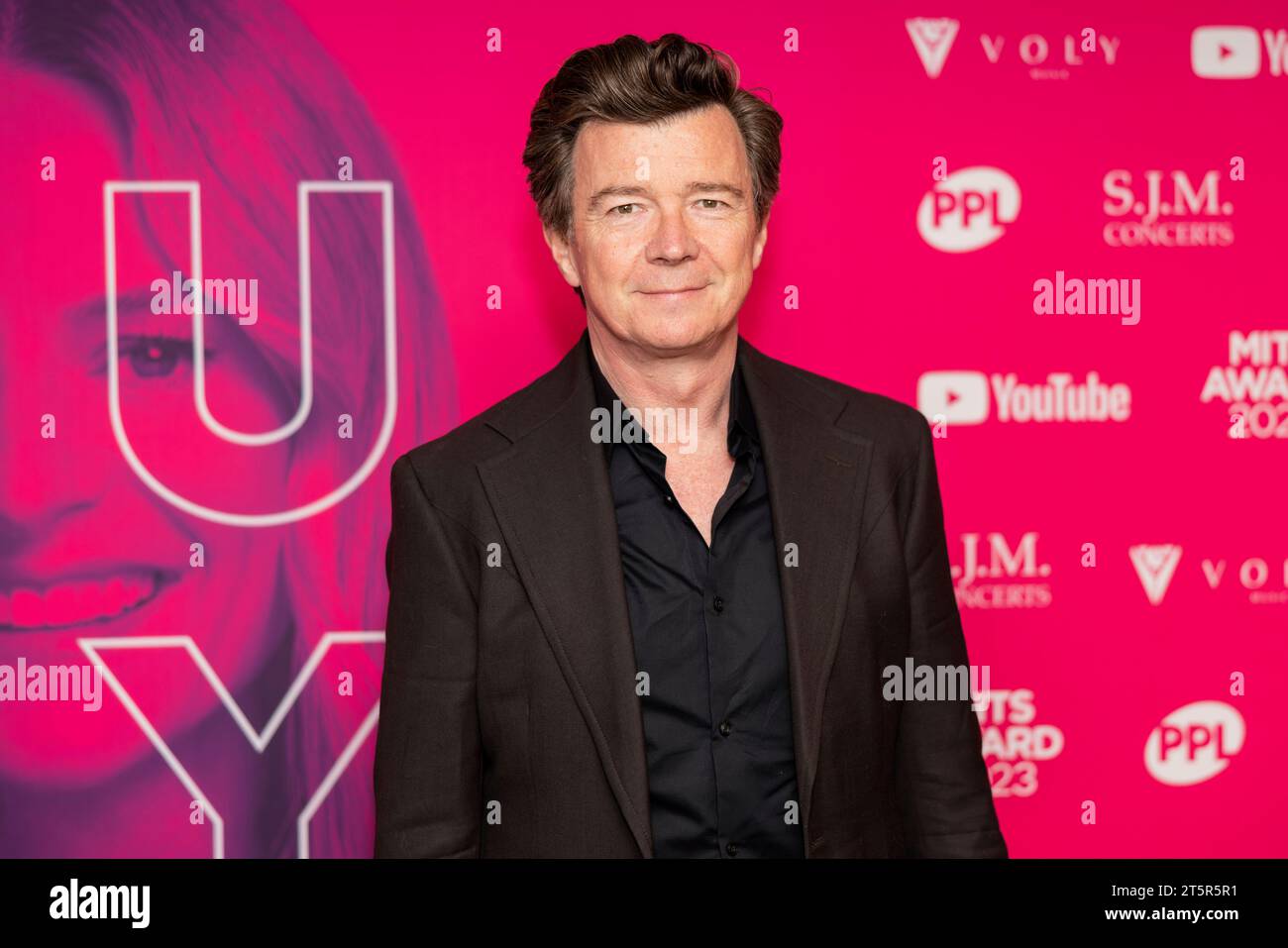 Rick Astley poses for photographers upon arrival at the Music Industry ...