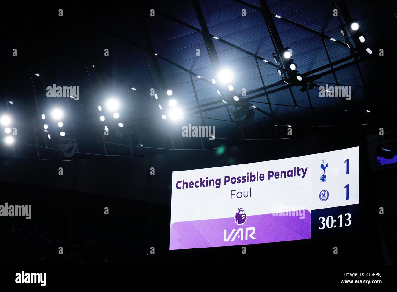 The big screen shows a VAR checking a possible penalty during the ...