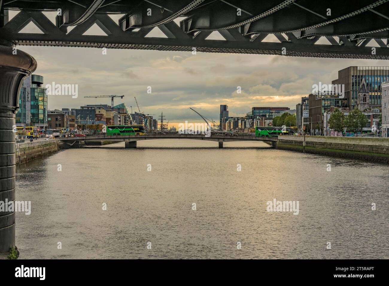 Dublin bridges over the Liffey River with the Dublin skyline Stock ...