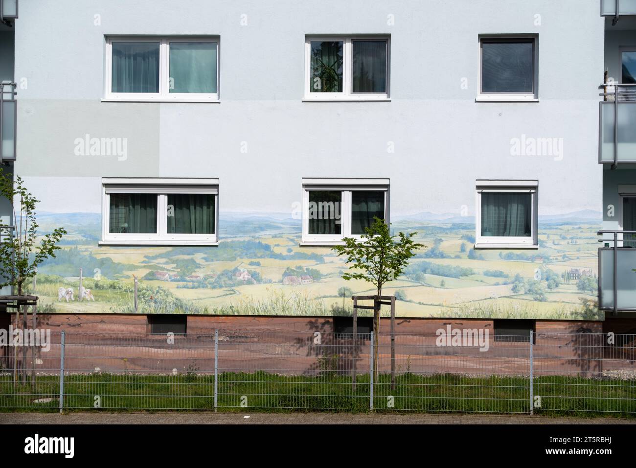 lovely rural German landscape mural on a high-rise building in silicate ...