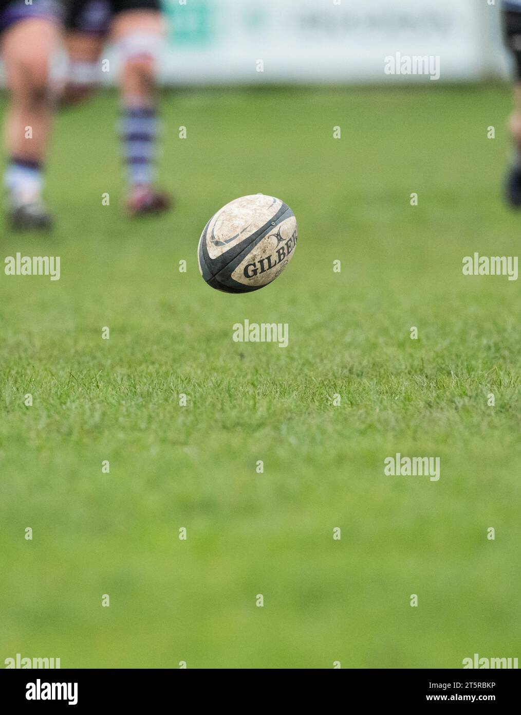 Gilbert rugby union football on the field of play and in flight Stock ...