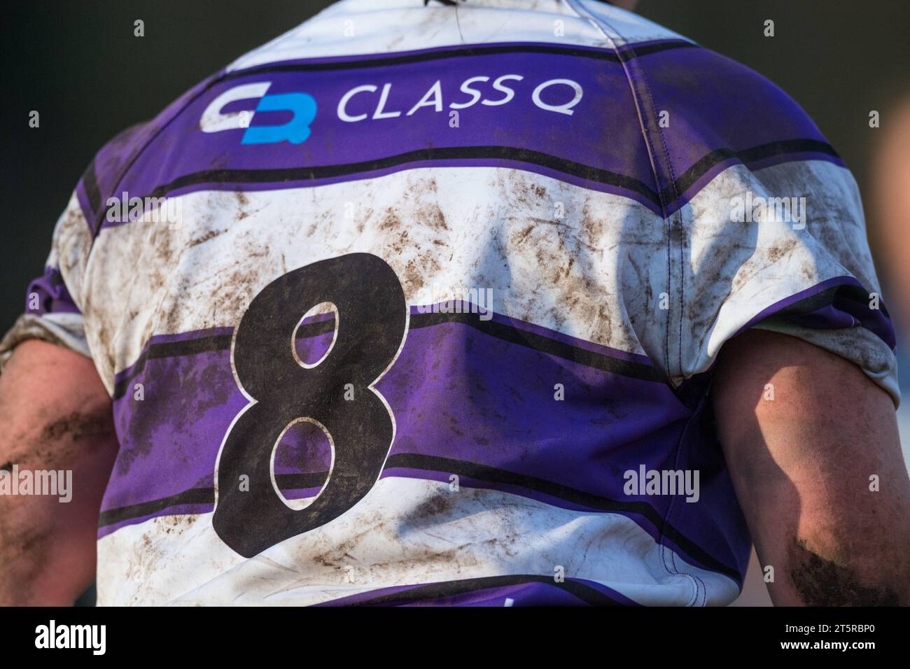 English amateur Rugby Union female player with a dirty and muddy rugby ...