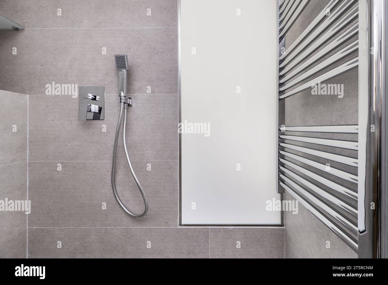 Interior of a shower cabin with radiator dry towels Stock Photo - Alamy
