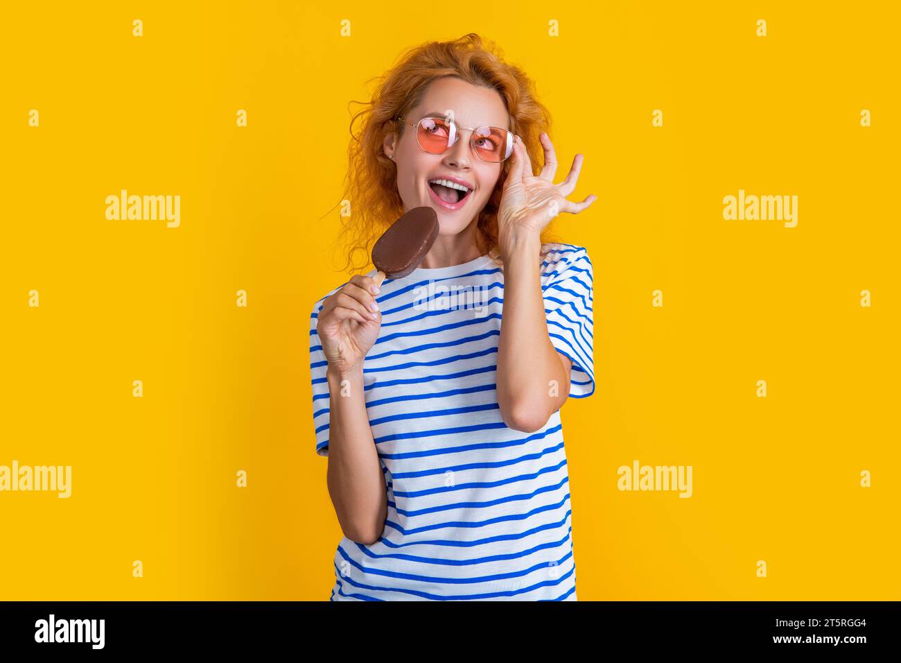 positive girl with icelolly ice cream on background. photo of girl with ...