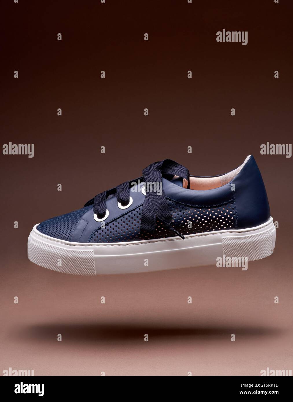 Female sneaker hi-res stock photography and images - Alamy