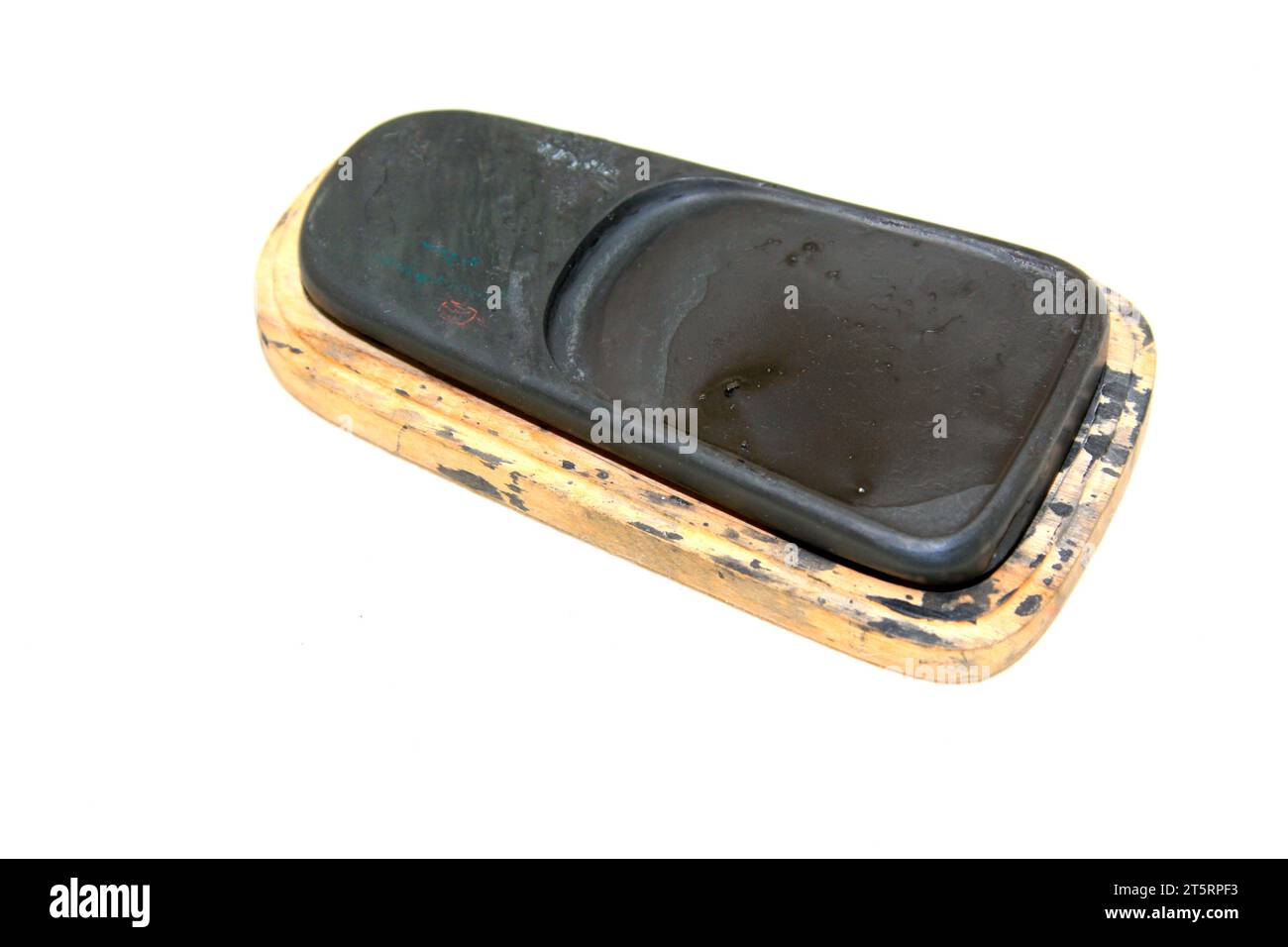 Chinese ancient cultural products inkstone on a white background ...