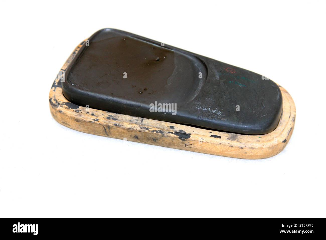 Chinese ancient cultural products inkstone on a white background ...