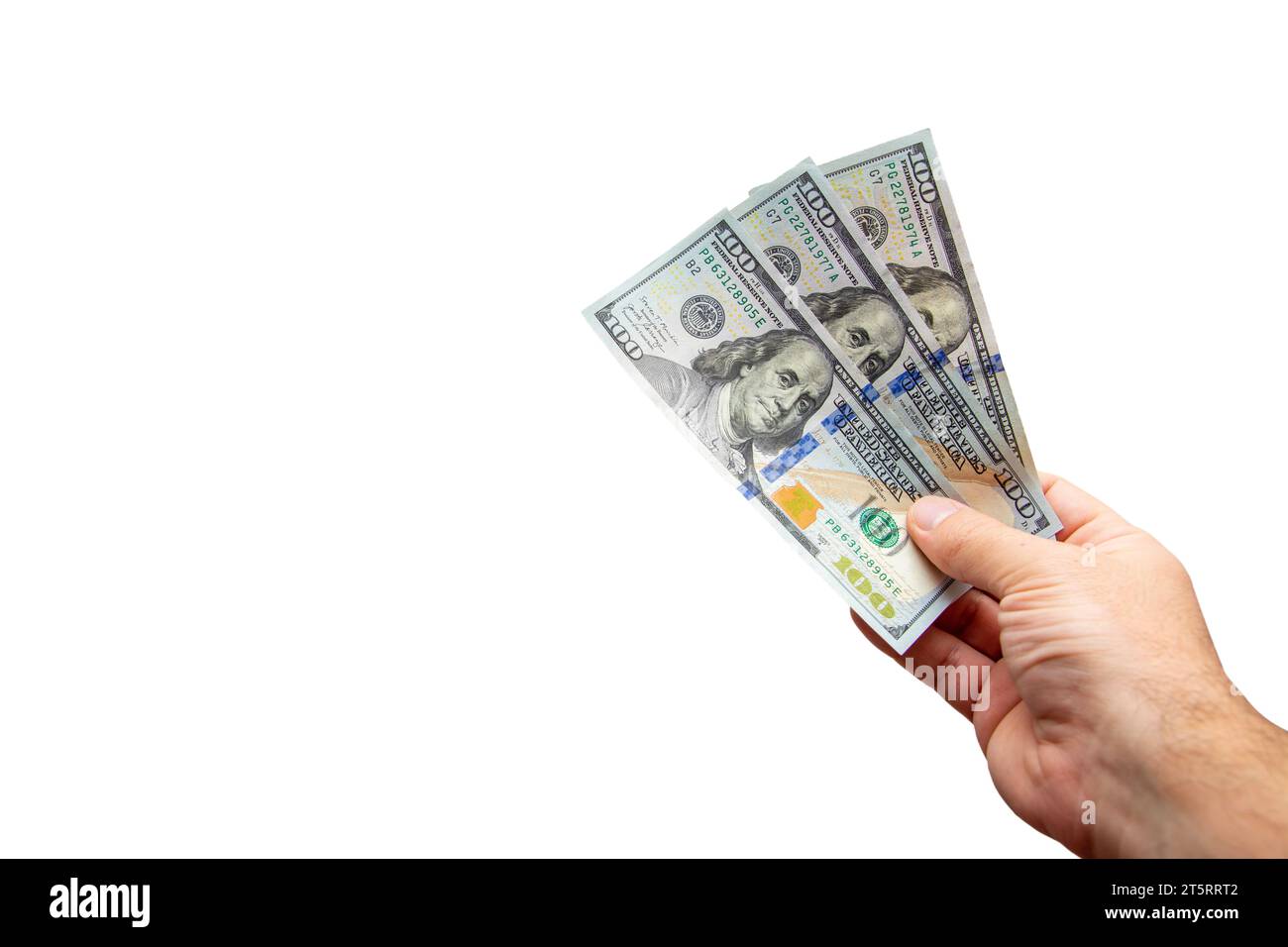 An unrecognizable hand shows 300 US Dollars from the corner of the ...