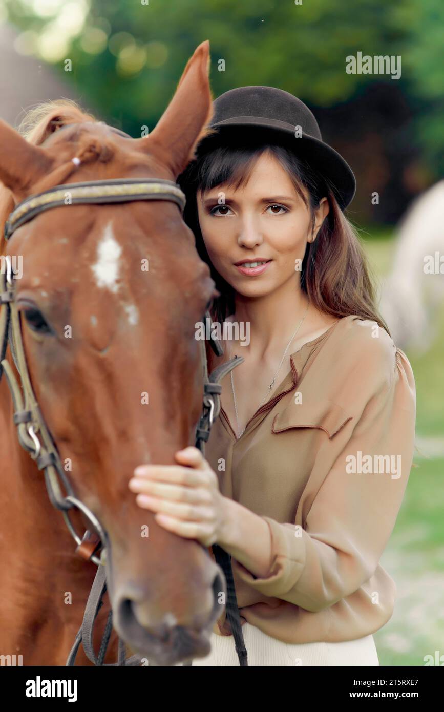The horse's head near the girls' head. They share an intimate moment ...