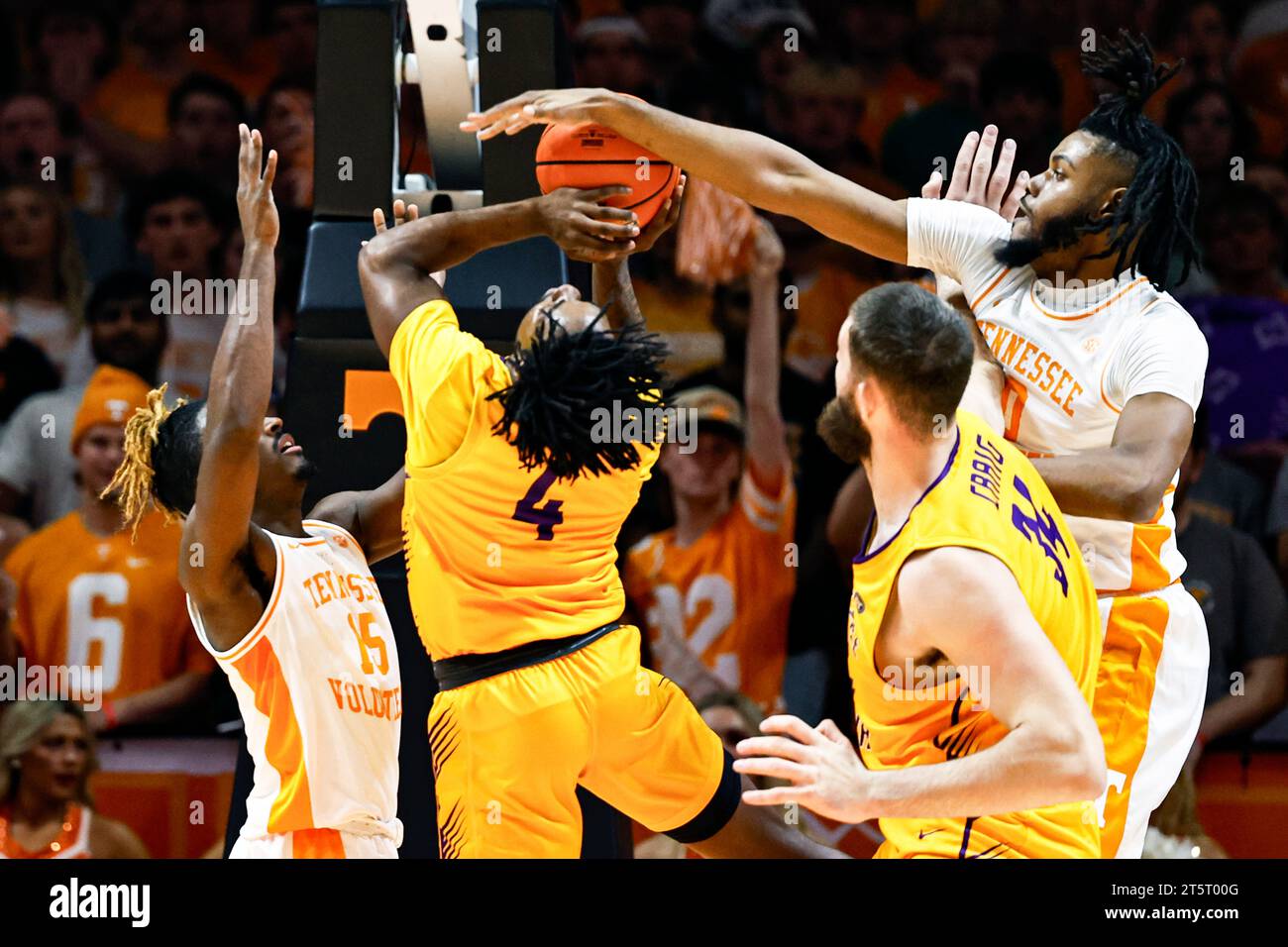 Tennessee Tech guard Josiah Davis (4) has his shot blocked by Tennessee ...