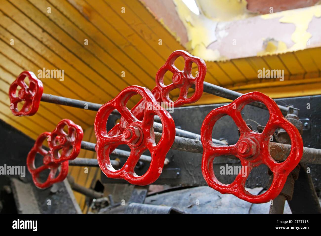 red handwheel in steam locomotive cab, closeup of photo Stock Photo - Alamy