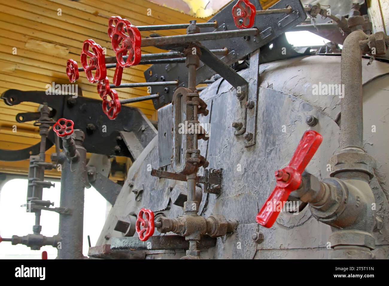 red handwheel in steam locomotive cab, closeup of photo Stock Photo - Alamy