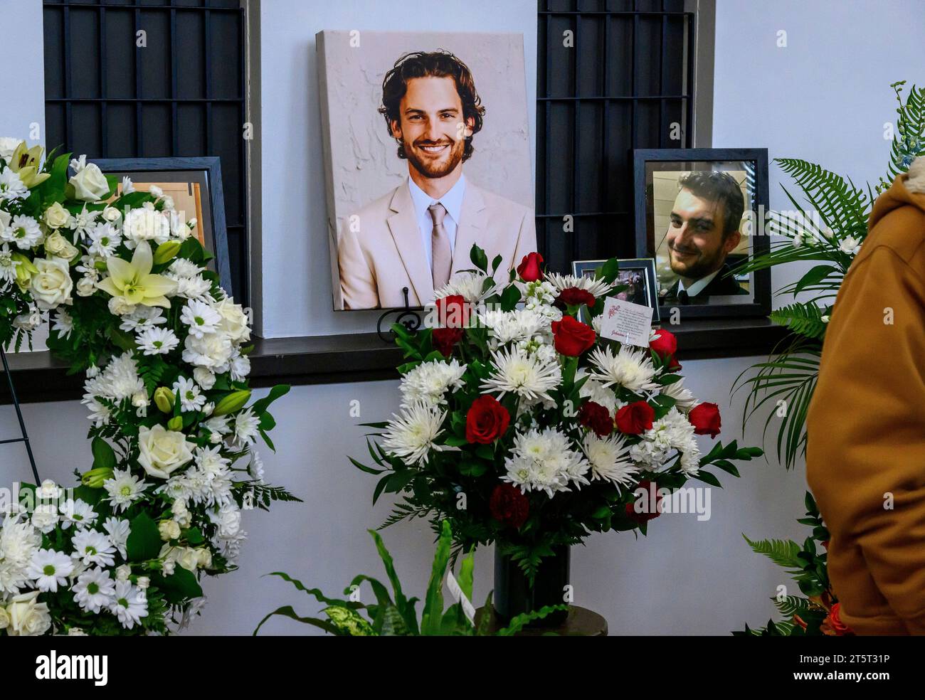 Photos of Adam Johnson line the ticket window booth at the Hibbing ...