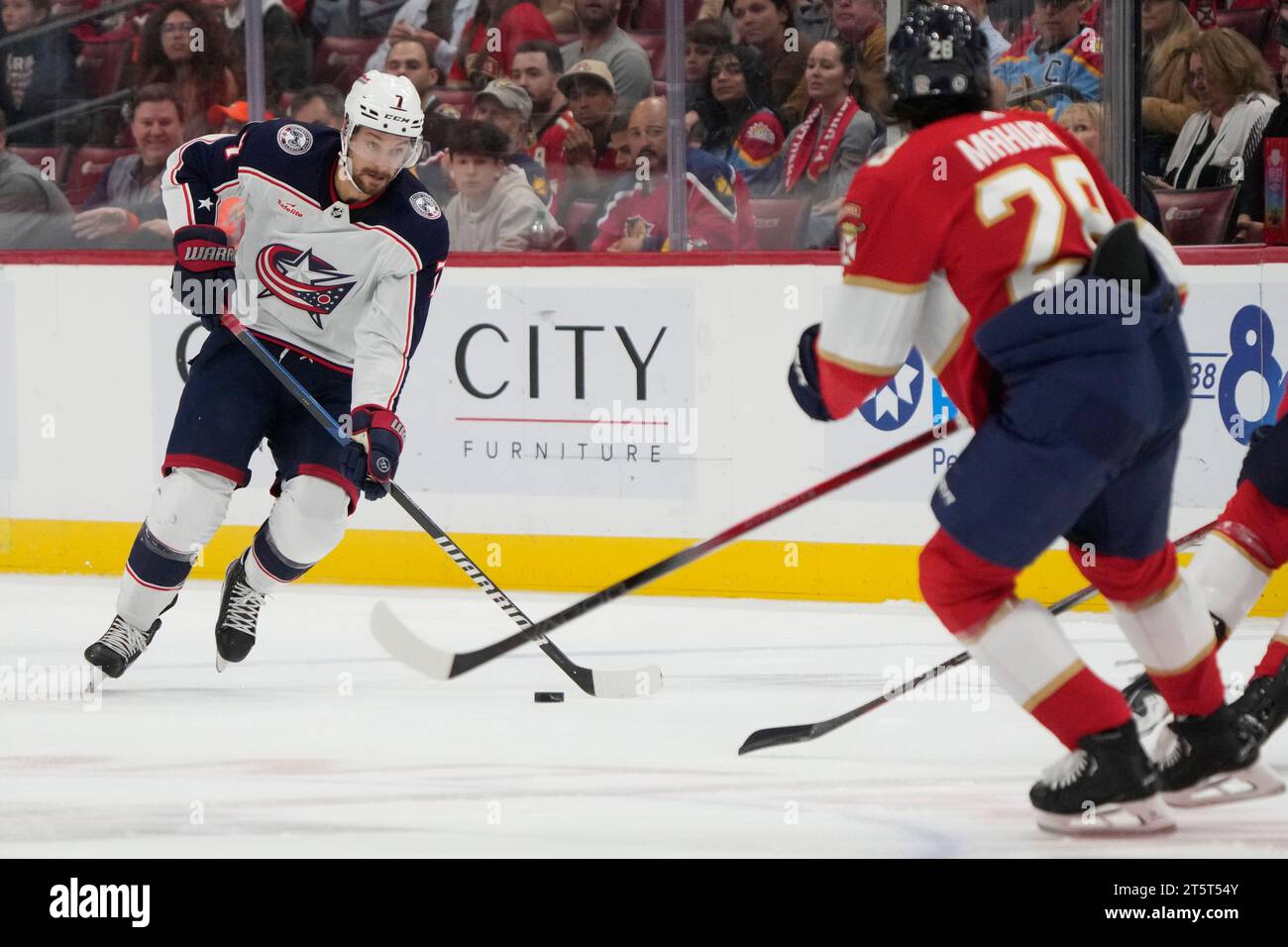 Columbus Blue Jackets center Sean Kuraly (7) takes the puck down the ...