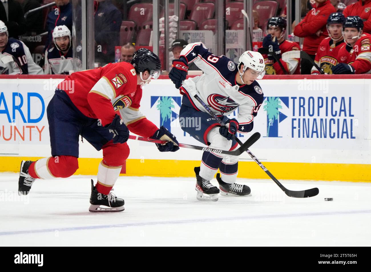 Columbus Blue Jackets right wing Yegor Chinakhov (59) and Florida Panthers defenseman Mike ...