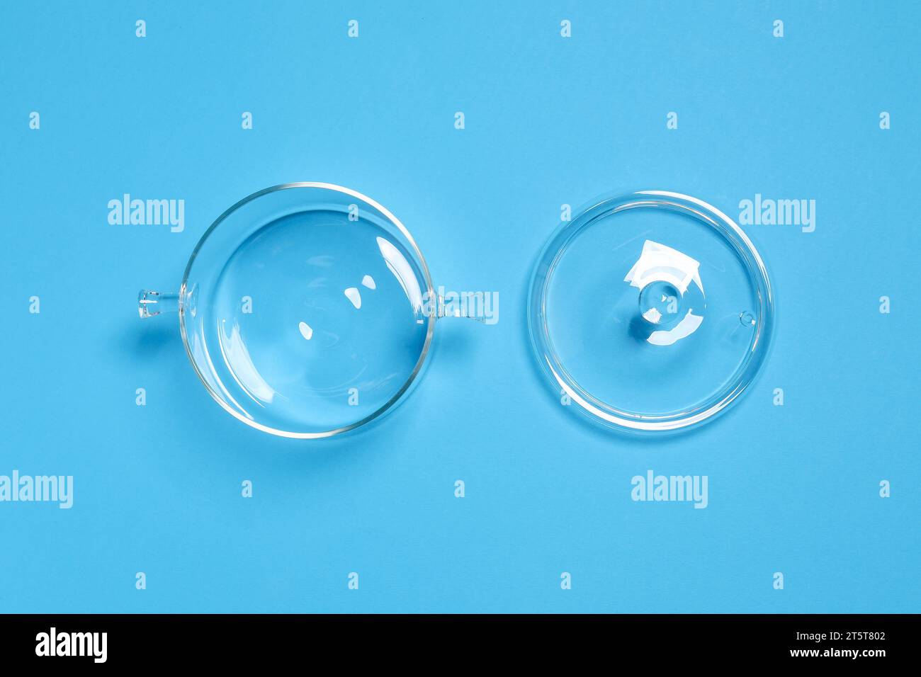 Empty glass pot and lid on light blue background, flat lay Stock Photo ...