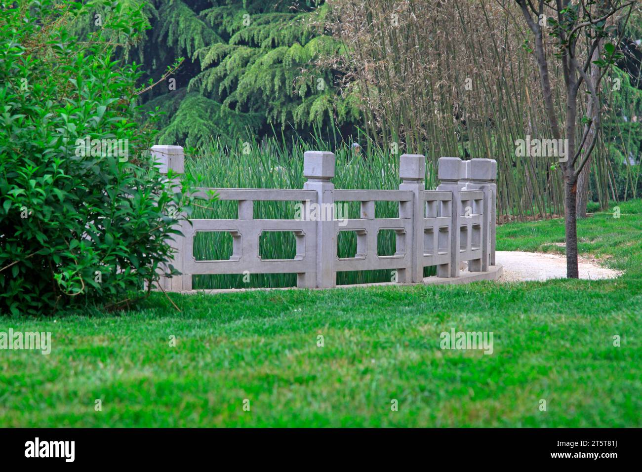 Rock railing in a park, closeup of photo Stock Photo - Alamy