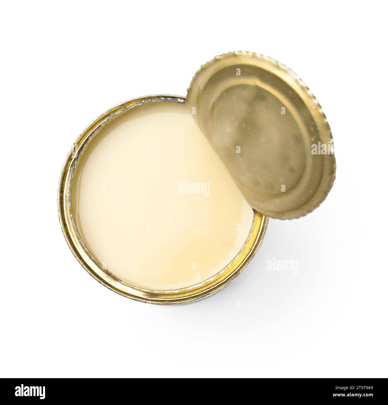 Open tin can with condensed milk isolated on white, top view Stock ...