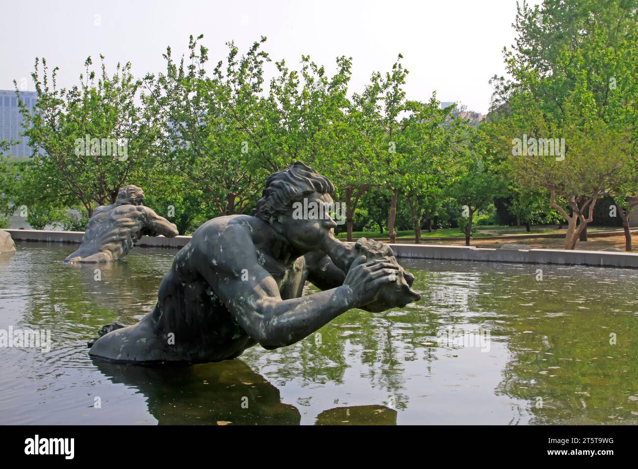 ancient Greek characters sculpture in a water park, closeup of photo ...