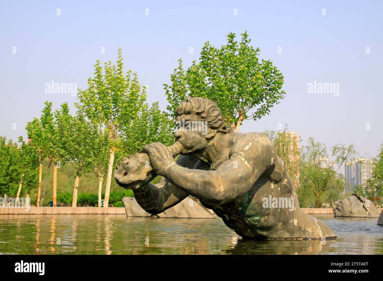 ancient Greek characters sculpture in a water park, closeup of photo ...