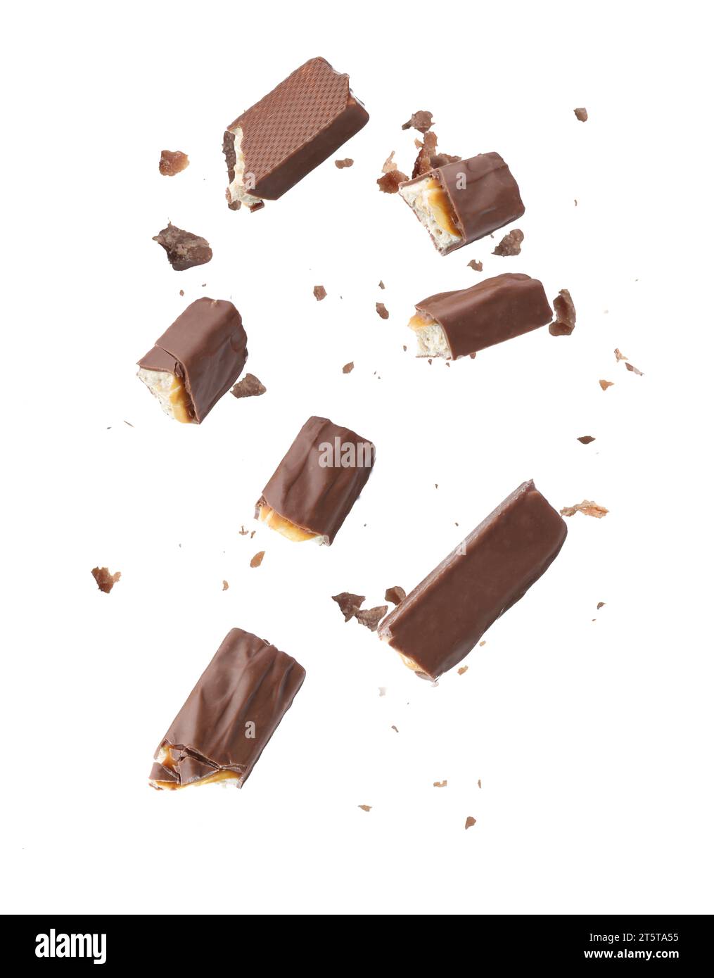 Pieces of chocolate bars falling on white background Stock Photo - Alamy