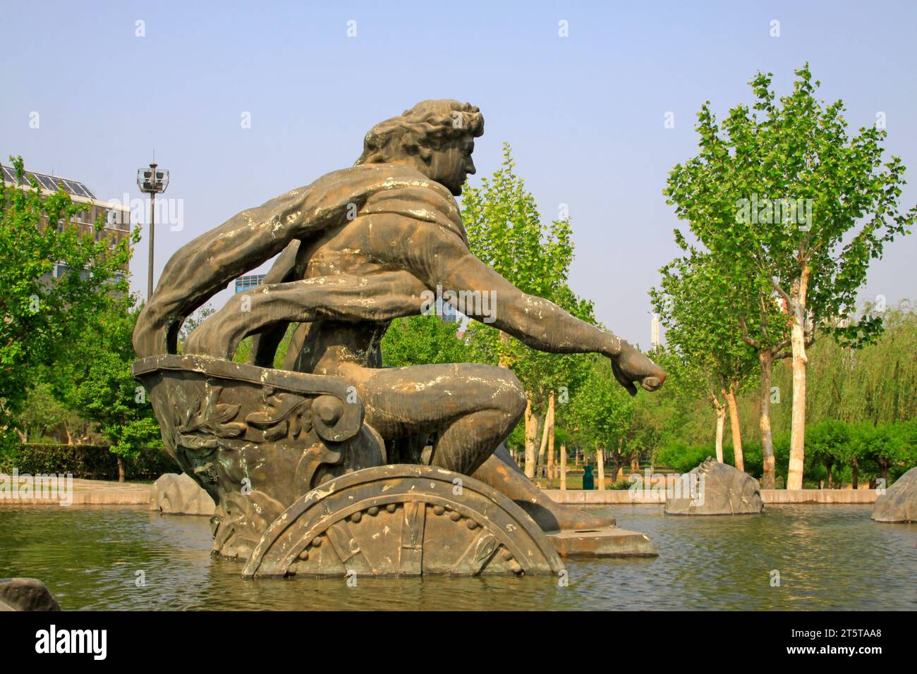 sun god Apollo sculpture in a water park, closeup of photo Stock Photo ...