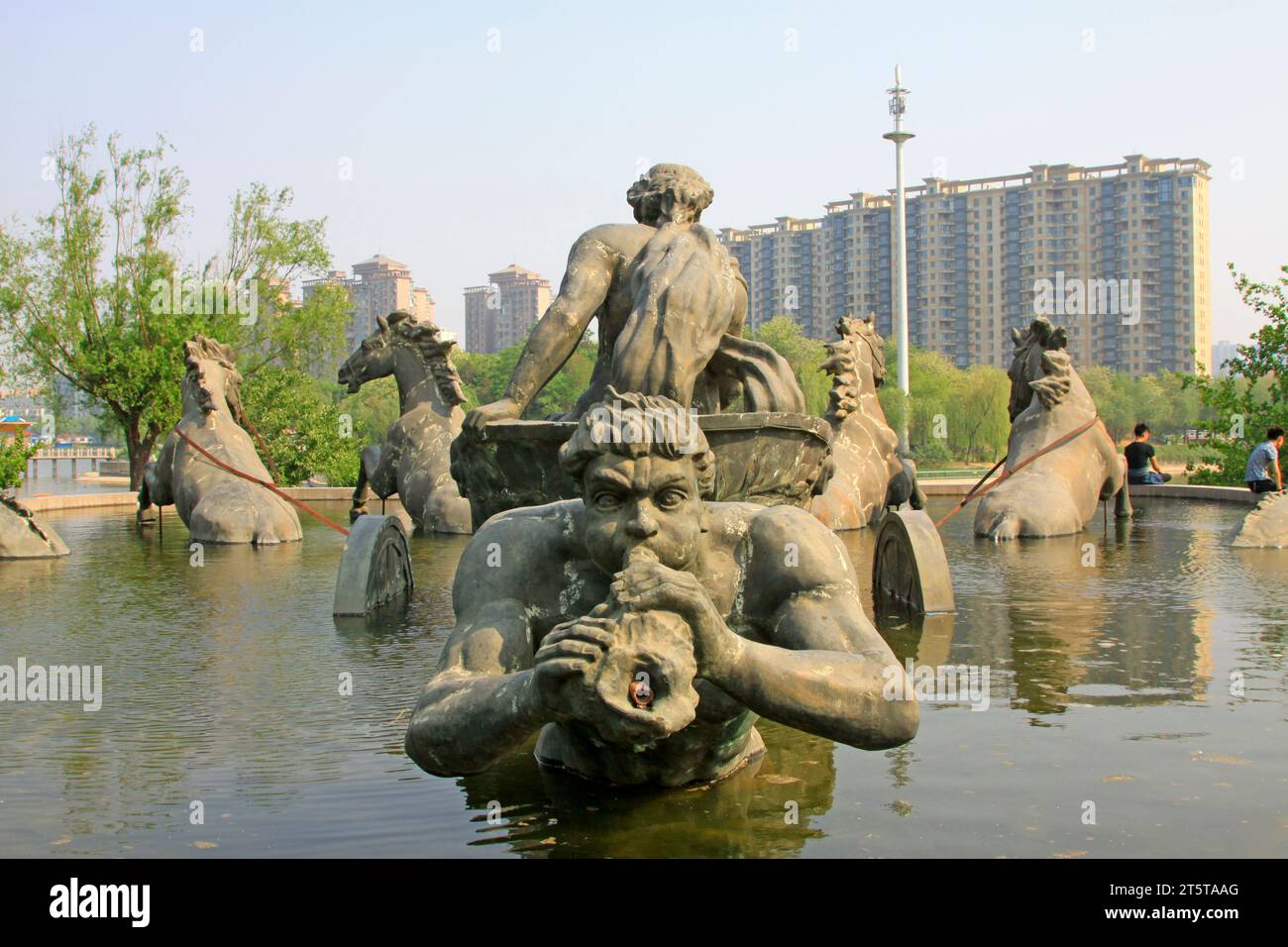 sun god Apollo sculpture in a water park, closeup of photo Stock Photo ...