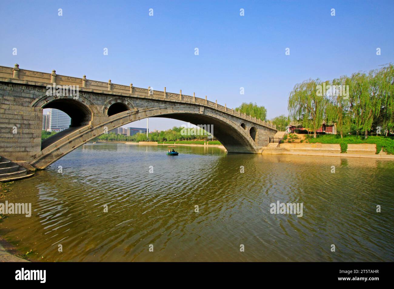 ancient stone bridge in a water park, closeup of photo Stock Photo - Alamy