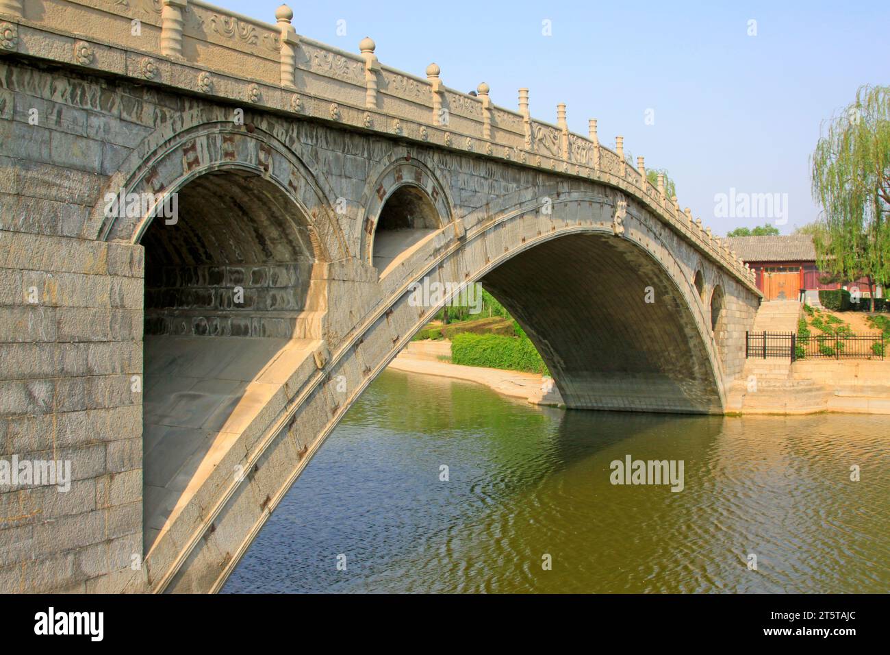 ancient stone bridge in a water park, closeup of photo Stock Photo - Alamy