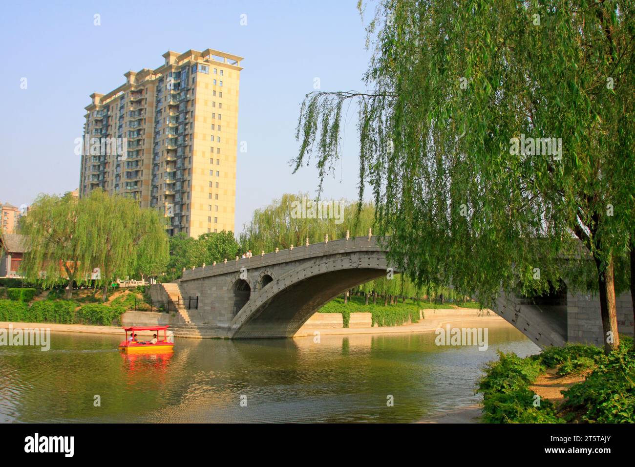 ancient stone bridge in a water park, closeup of photo Stock Photo - Alamy