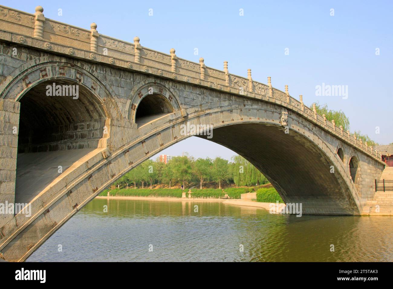 ancient stone bridge in a water park, closeup of photo Stock Photo - Alamy