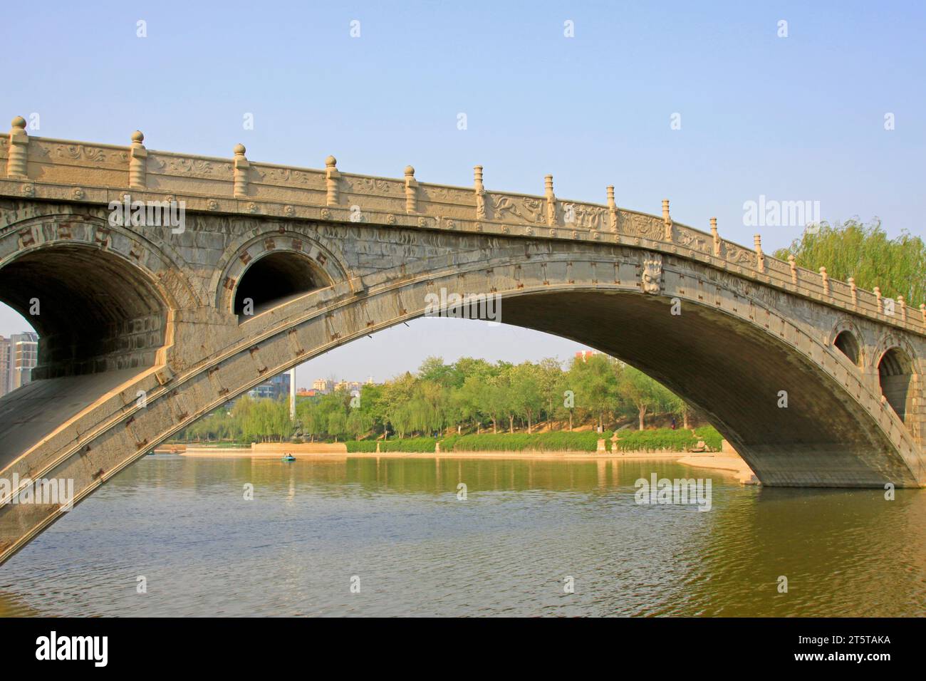 ancient stone bridge in a water park, closeup of photo Stock Photo - Alamy