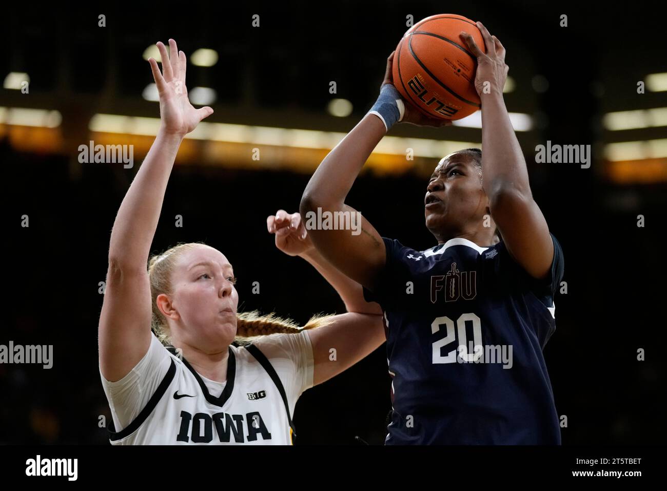 Fairleigh Dickinson center Teneisia Brown (20) drives to the basket ...