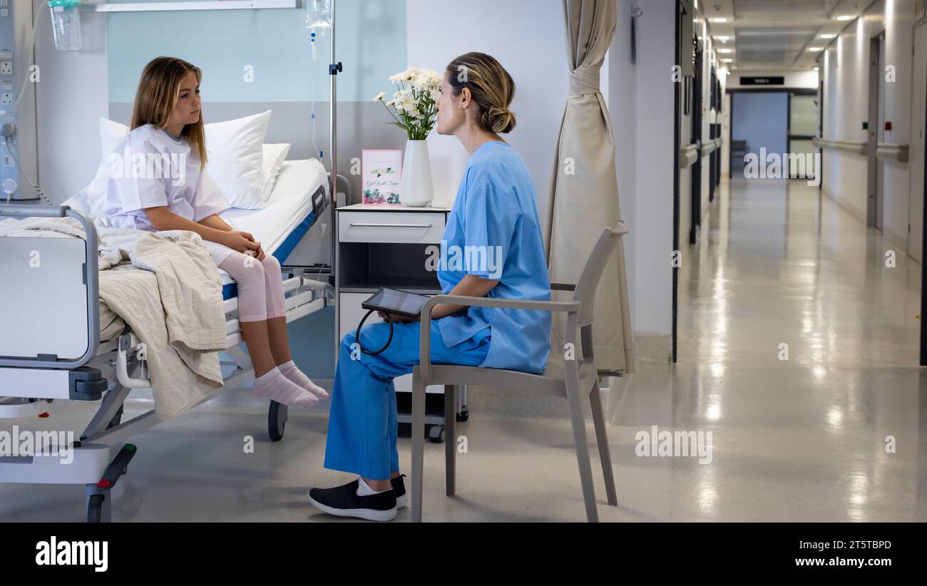 Doctor patient female hospital ward hi-res stock photography and images ...