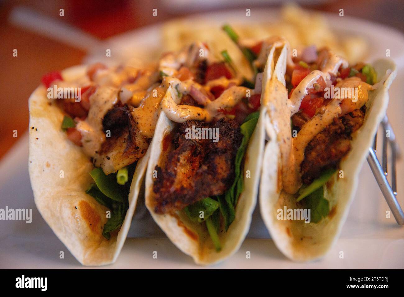 Freshly Made Cajun Style Fish Tacos Stock Photo - Alamy
