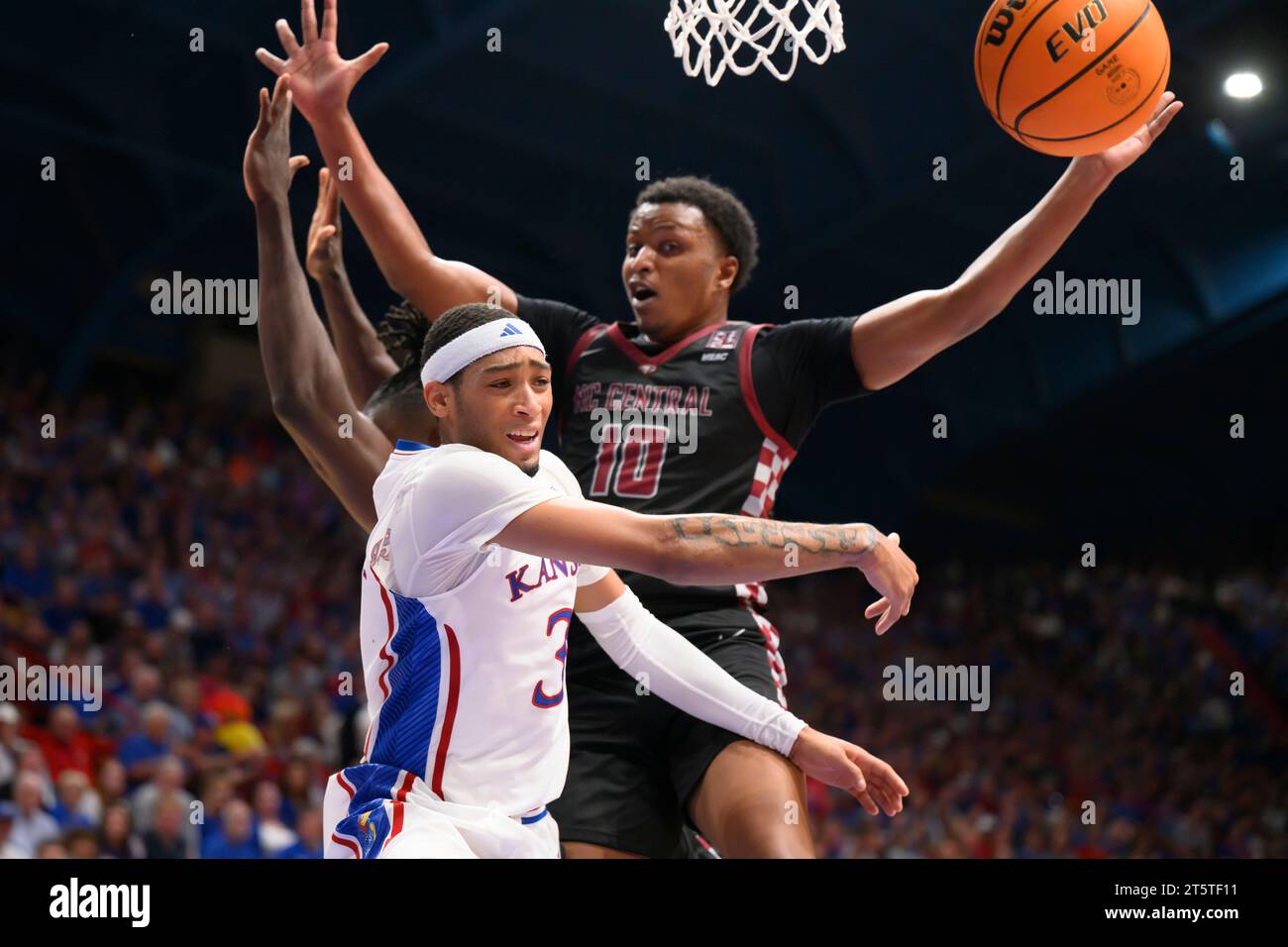 Kansas guard Dajuan Harris Jr. is fouled by North Carolina Central ...