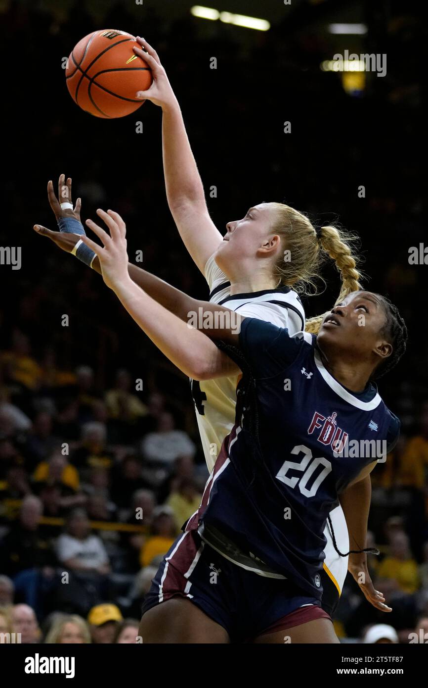 Iowa forward Addison O'Grady grabs a rebound over Fairleigh Dickinson ...