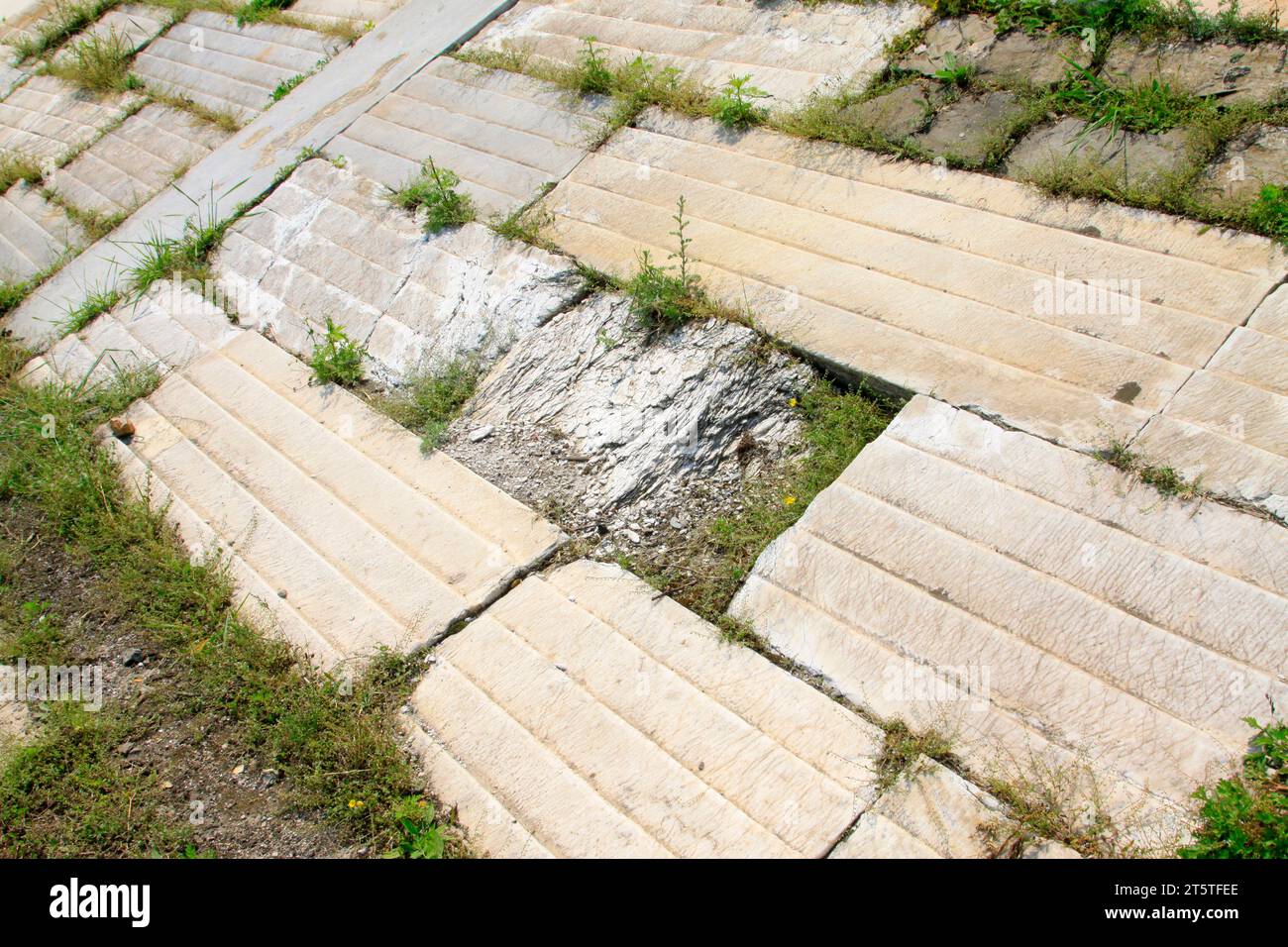 Broken stone on the ground, closeup of photo Stock Photo - Alamy