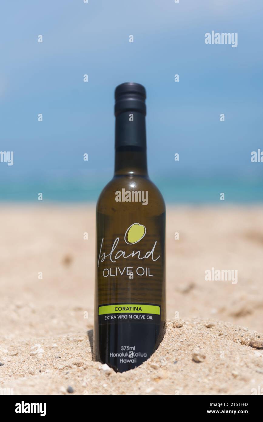 A bottle of olive oil at the beach Stock Photo - Alamy