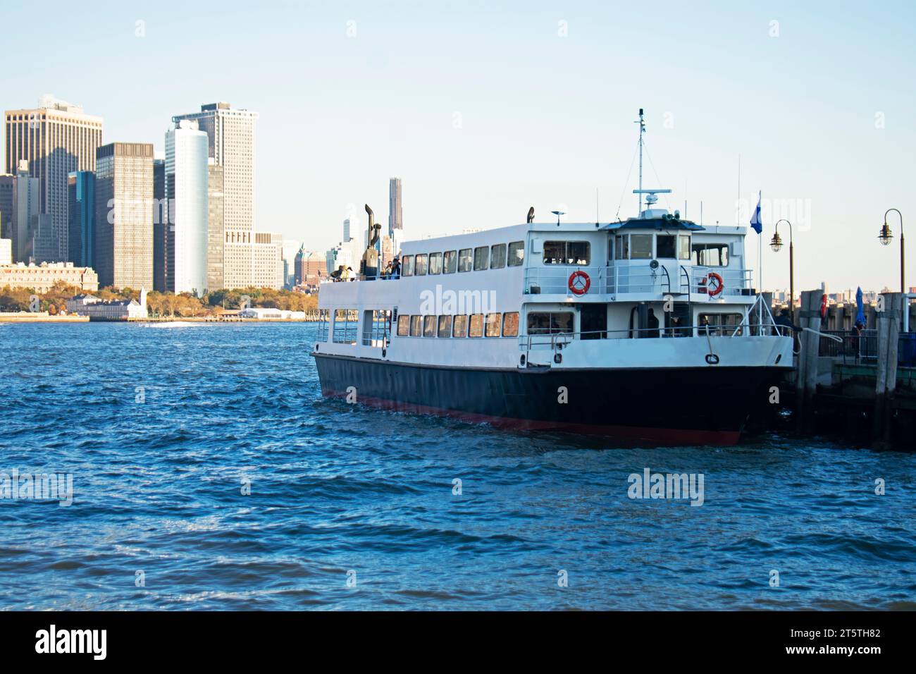 Boat tours loading and unloading passengers for a late afternoon Hudson ...