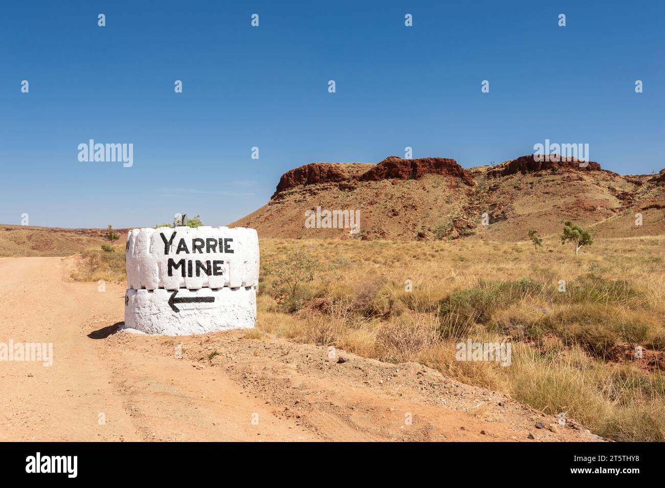 Direction sign to the Yarrie mine on a dirt road in the Pilbara, a ...