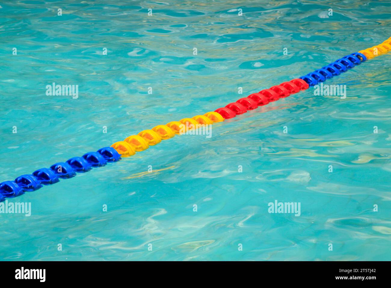 Color plastic lines in the water Stock Photo - Alamy