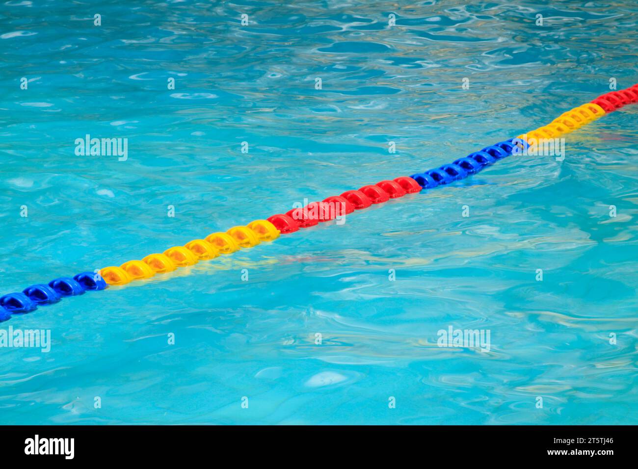 Color plastic lines in the water Stock Photo - Alamy