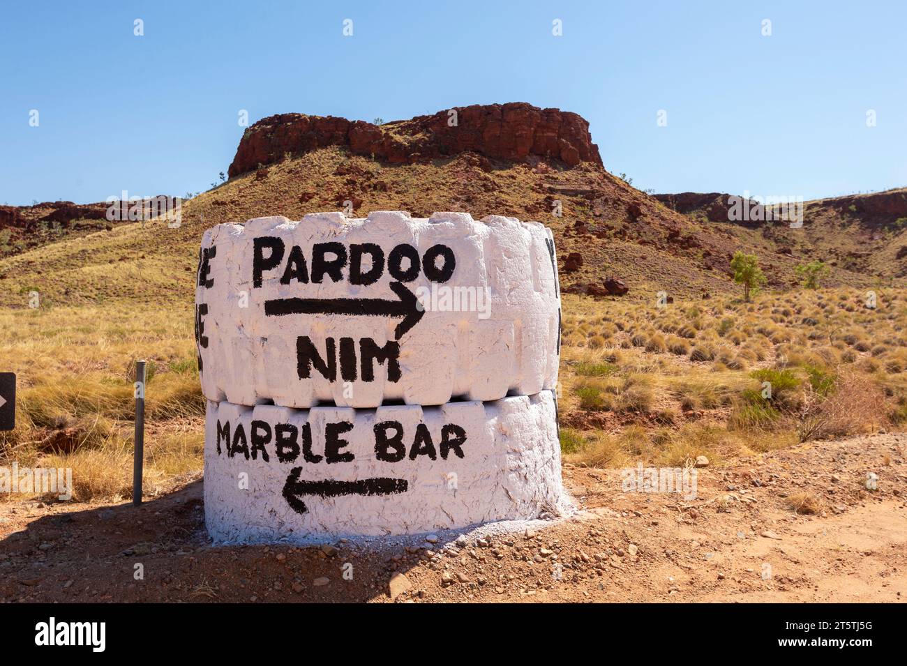 Direction sign on a dirt road in the Pilbara, a mining region in ...